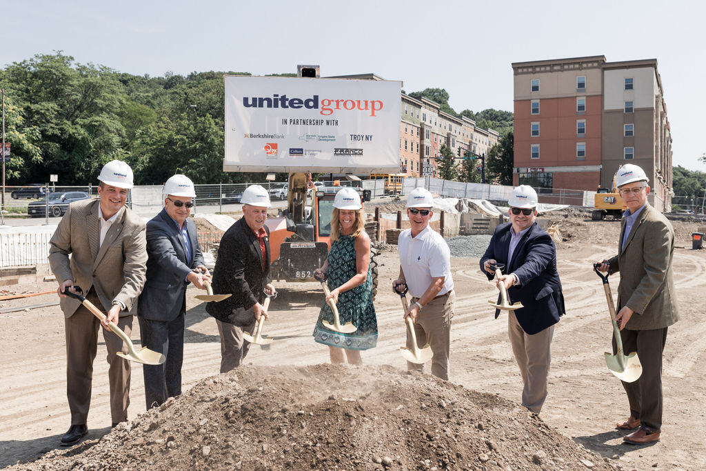 United Group breaks ground on mixed-use housing development in downtown ...